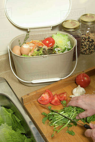 Organic Recycling, Kitchen Compost Pail - Stock Photo - Dissolve