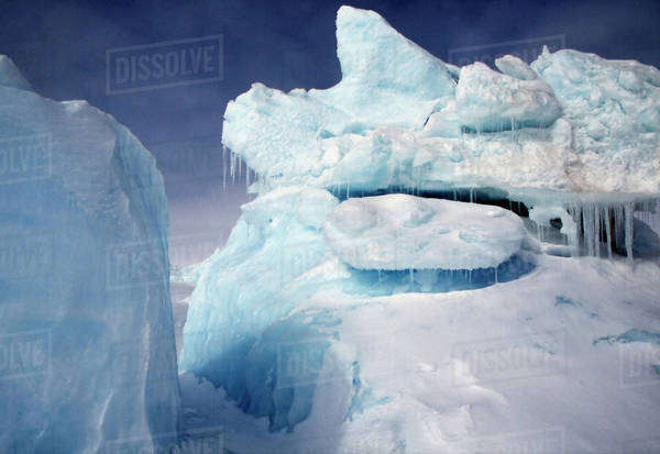 Iceberg Frozen Into The Arctic Ocean Near Griffith Island, Nunavut In ...