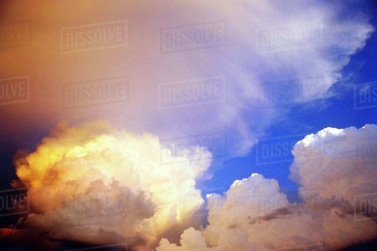 Large Yellow Sunset Clouds - Stock Photo - Dissolve