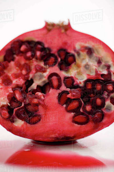 Close-Up Cross Section Of Pomegranate - Royalty-free Stock Photo | Dissolve