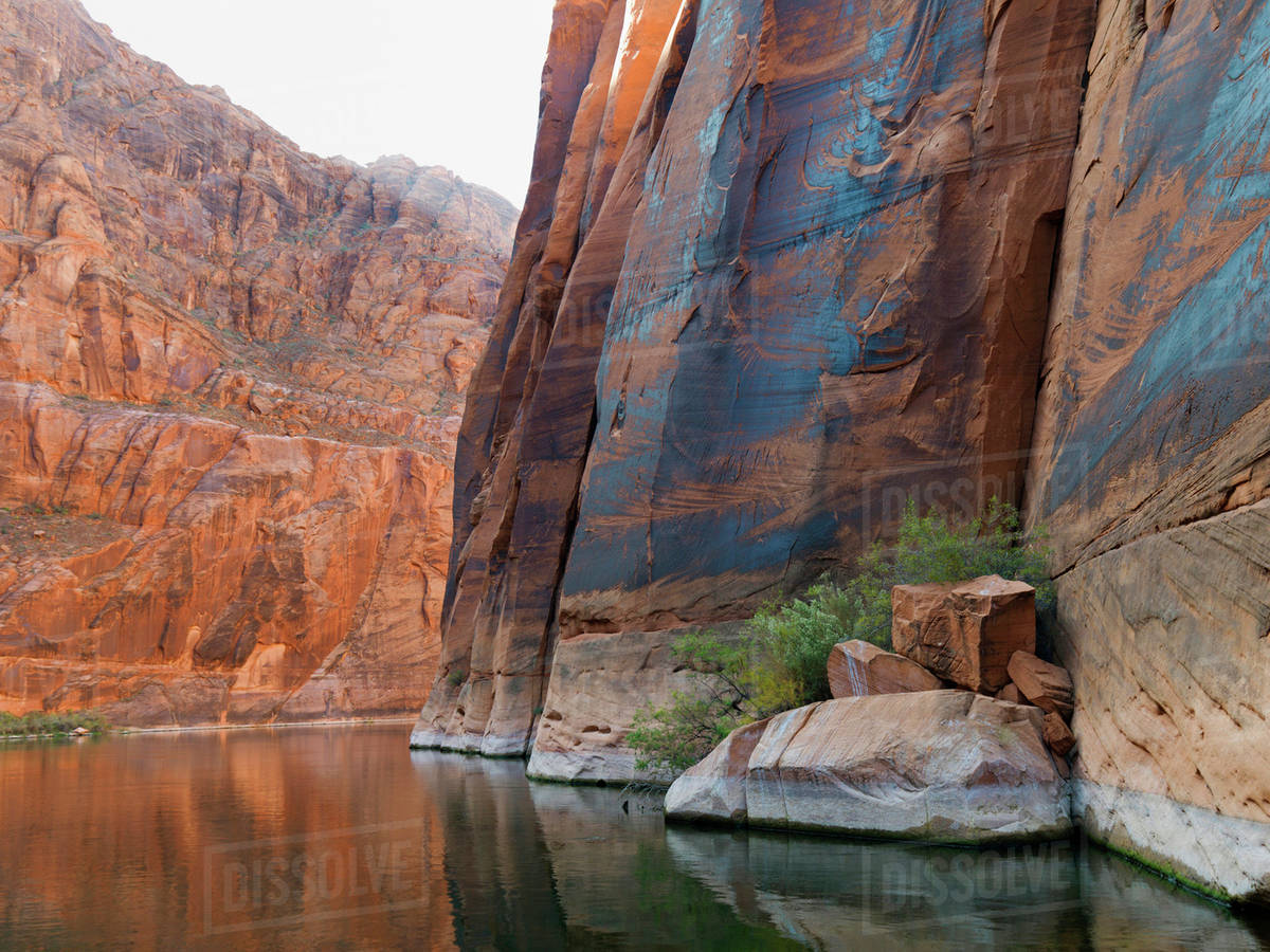 Steep Rock Cliffs Along The Shoreline Of Colorado River; Arizona ...
