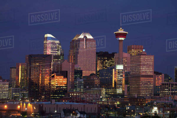 Calgary Skyline At Dawn With City Lights And Deep Blue Sky With ...