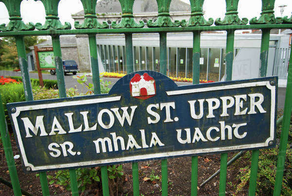 Sign posted on a fence for mallow st. upper;Ireland - Stock Photo ...