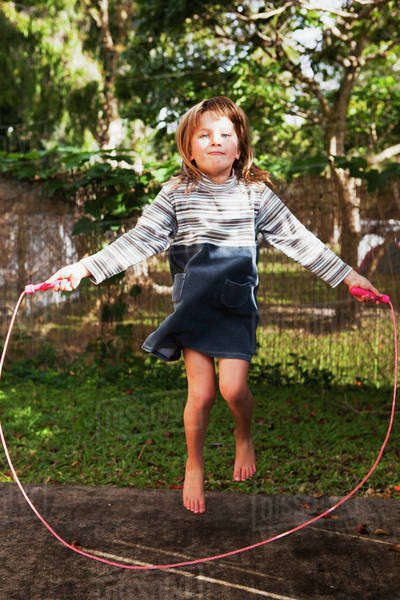 A young girl jumping rope;Gold coast queensland australia - Royalty ...