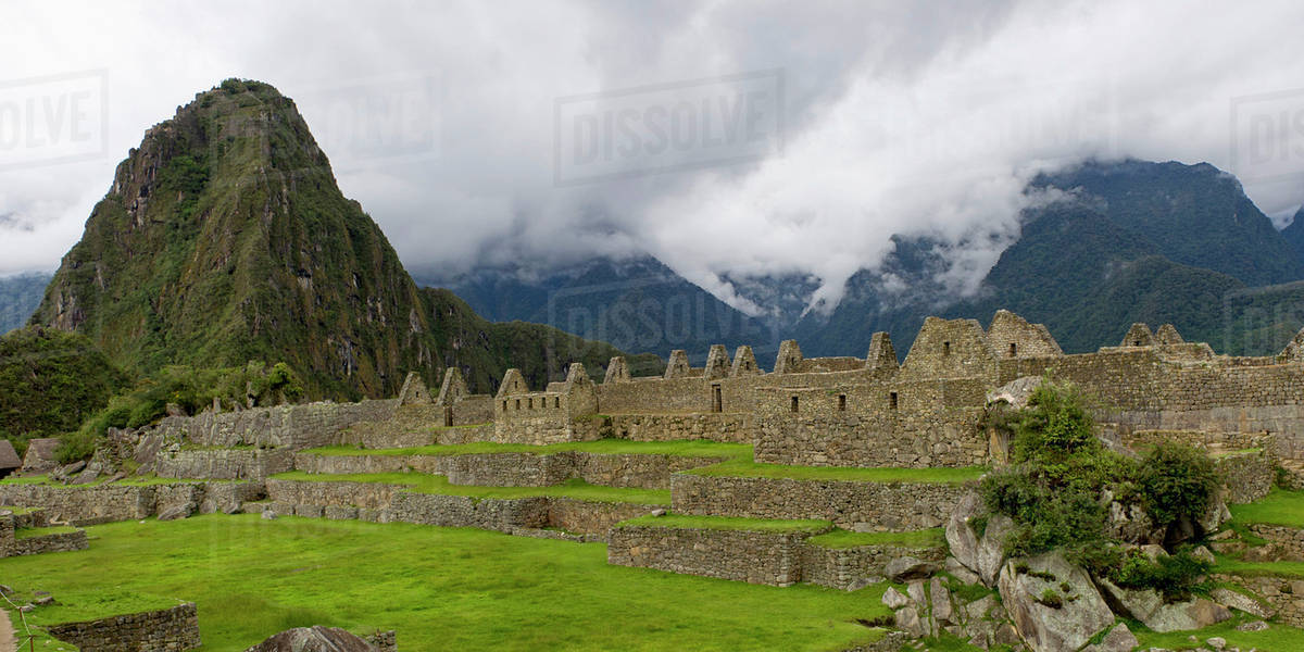 Stone Structures At Machu Picchu; Peru - Stock Photo - Dissolve