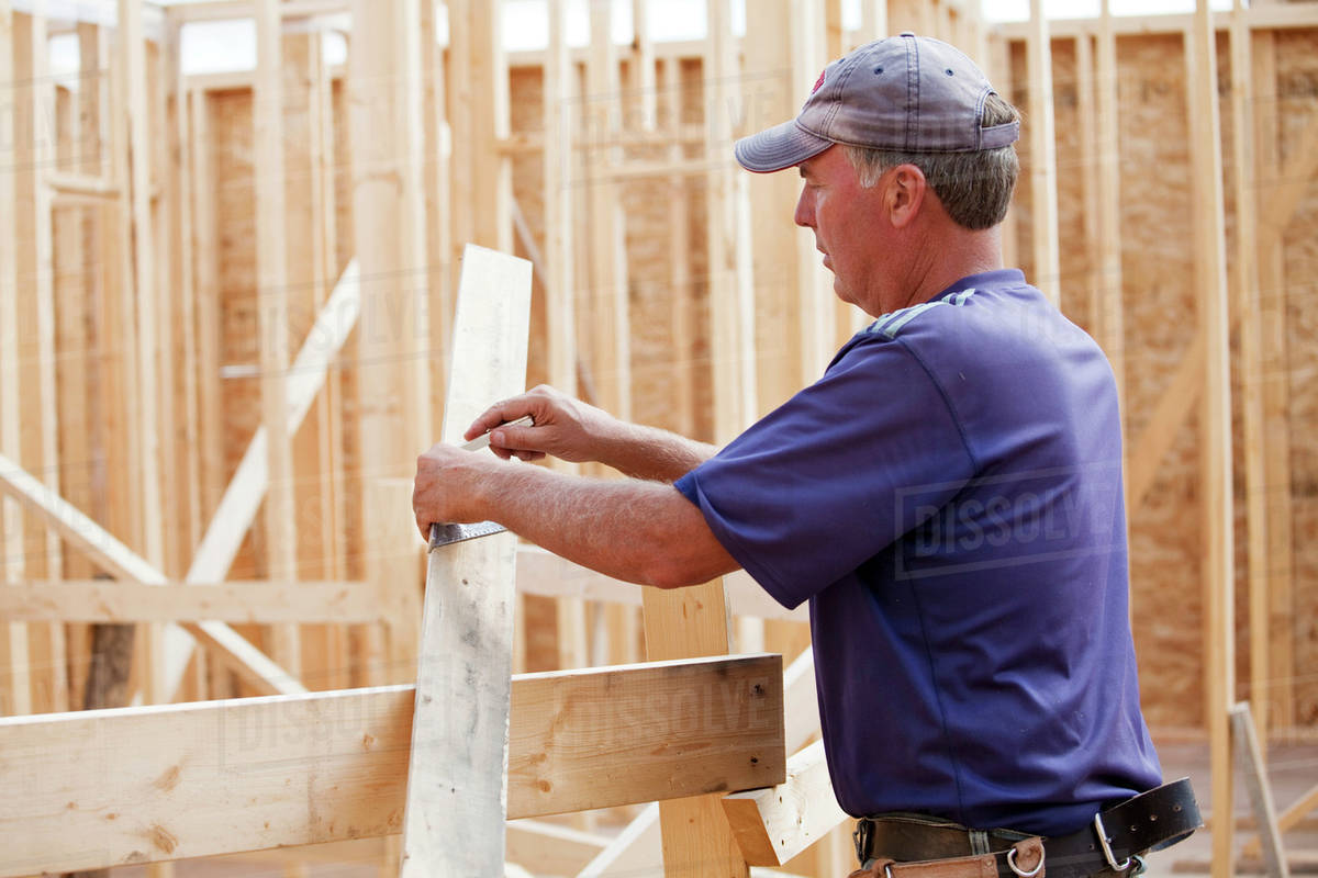 Tradesman Working On Framing For New Home Construction; St. Albert ...