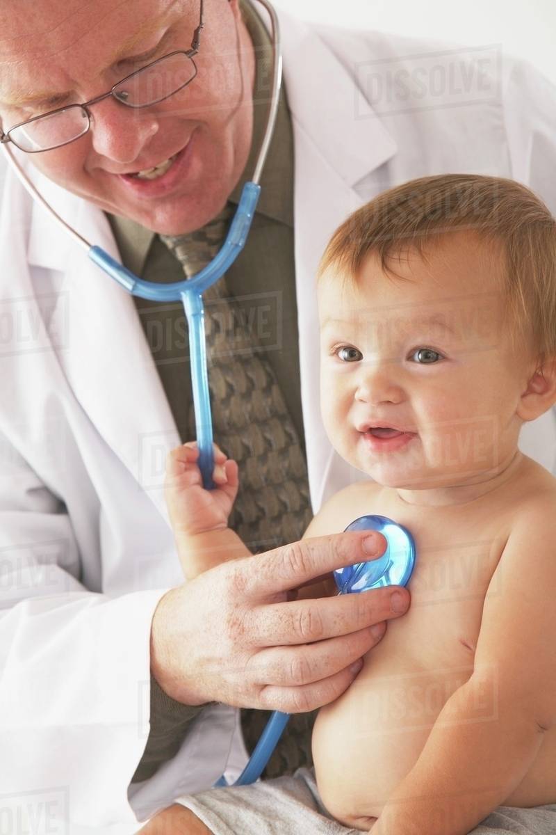 A Pediatrician Examining A Baby - Royalty-free Stock Photo | Dissolve