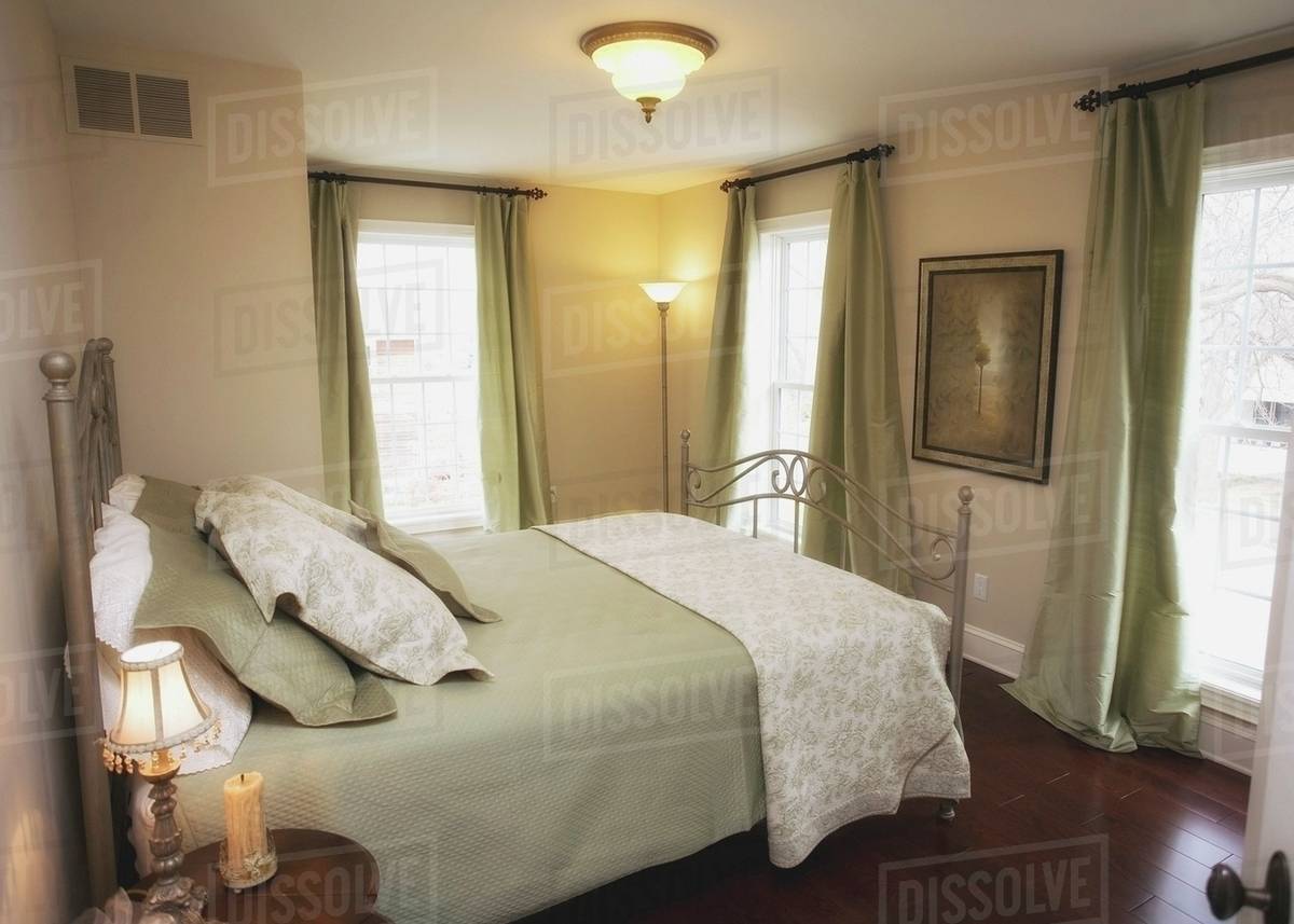 A Bedroom With Large Windows - Royalty-free Stock Photo | Dissolve