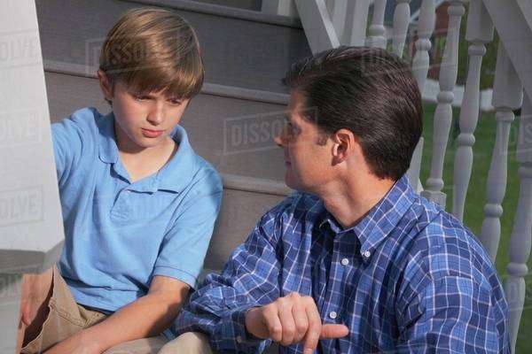 A Father Talking To His Son - Royalty-free Stock Photo | Dissolve