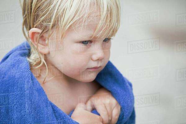 A Child With Wet Hair Wrapped In A Towel; Currumbin, Gold Coast ...