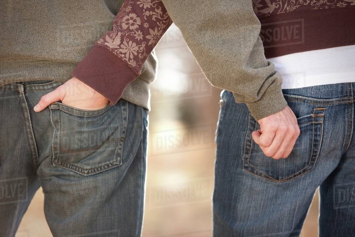 Couple With Hands In Each Others Back Pockets - Royalty-free Stock ...