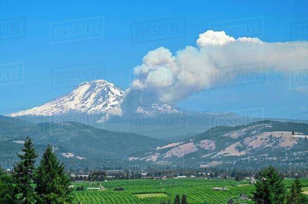 Fire On Side Of Mountain, Mt. Adams, Oregon, Usa - Stock Photo - Dissolve