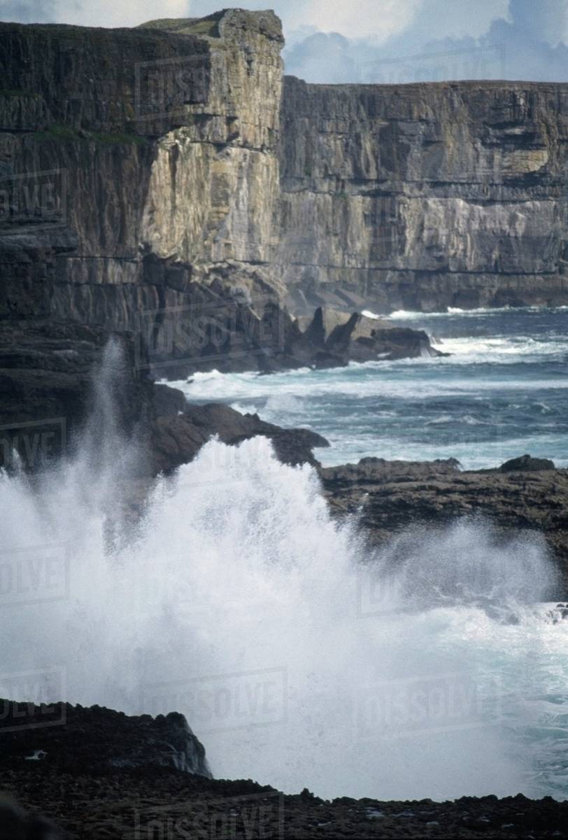 Steep Cliffs And Waves; Ireland - Royalty-free Stock Photo | Dissolve