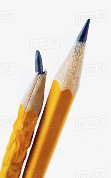 Chewed And New Pencil - Stock Photo - Dissolve