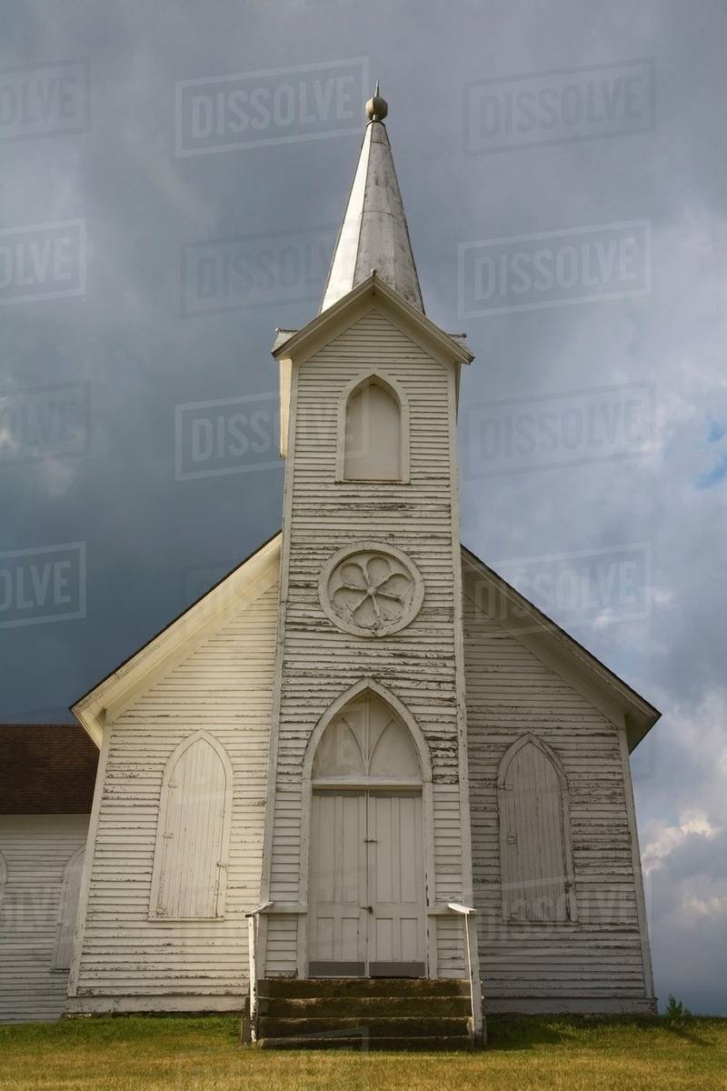 Weathered Church And Dark Skies - Royalty-free Stock Photo | Dissolve