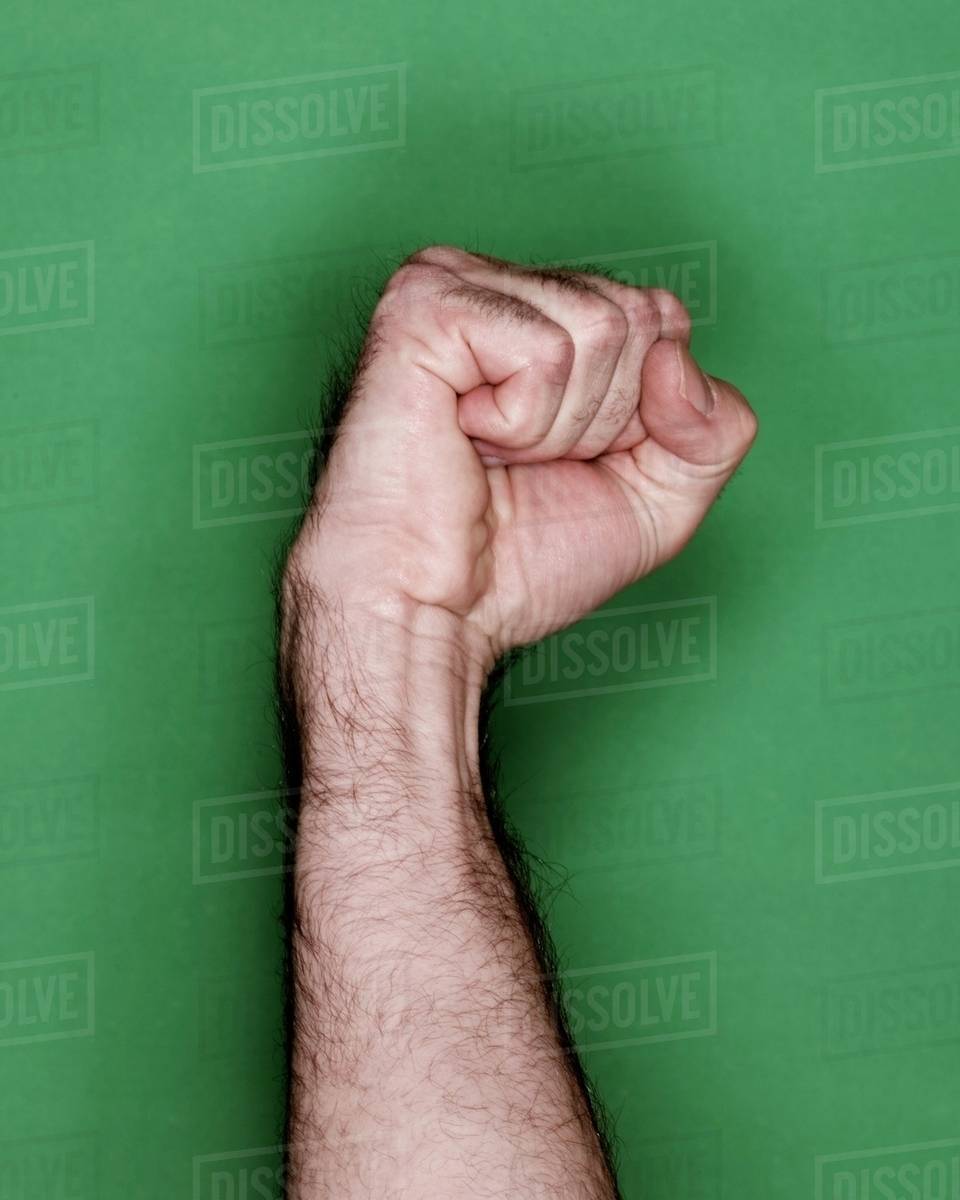 Man With His Hand In A Fist - Royalty-free Stock Photo | Dissolve
