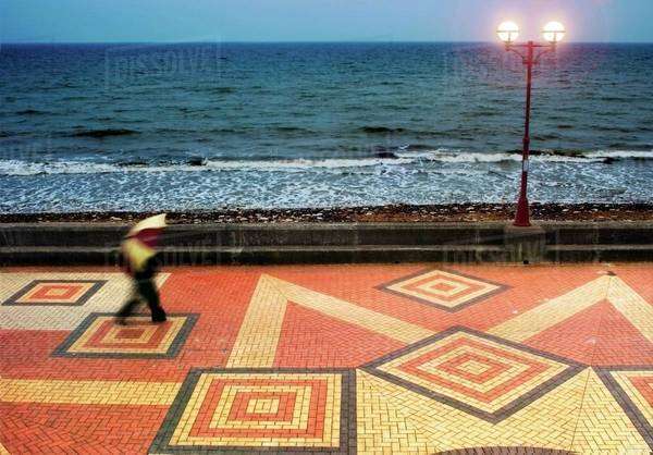 Walking On The Promenade - Royalty-free Stock Photo | Dissolve