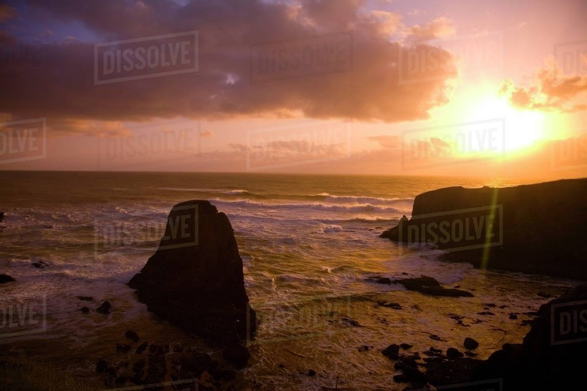 Rocky Coastline At Sunset - Royalty-free Stock Photo | Dissolve