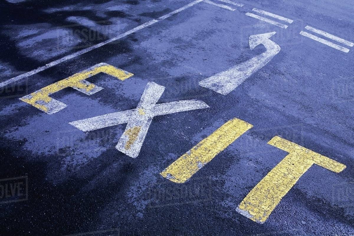 Exit Sign Painted On Road - Stock Photo - Dissolve