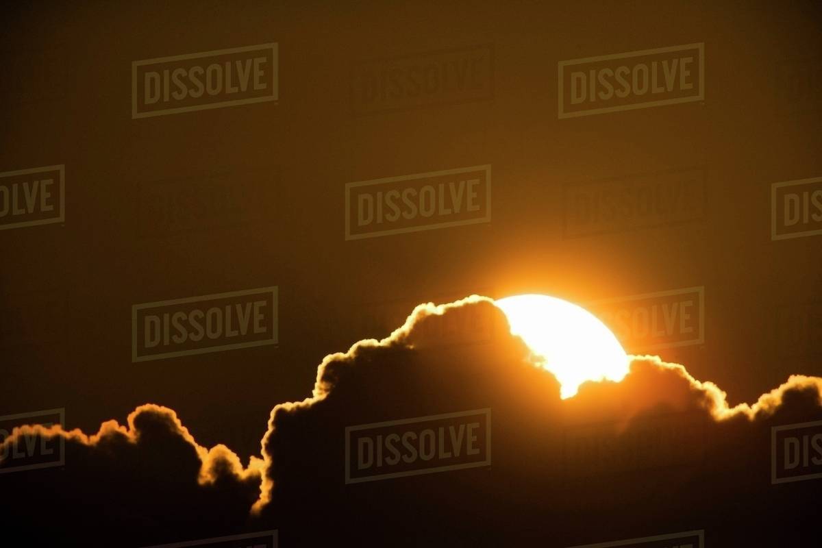 Sun Coming Out From Behind Clouds - Royalty-free Stock Photo | Dissolve