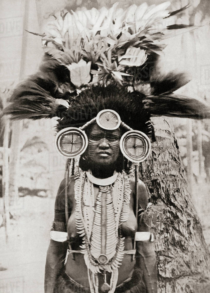 A woman of the Roro tribe from Papua New Guinea, Melanesia, decorated ...