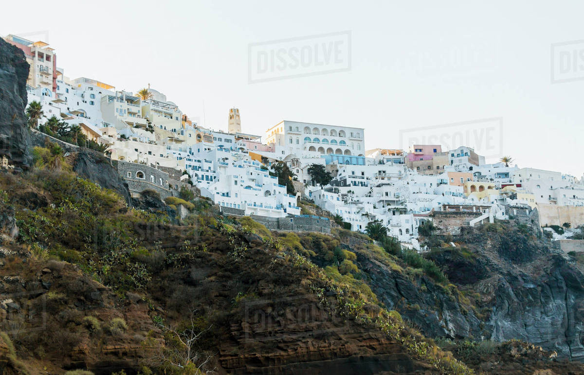 Whitewash buildings on a hillside on a greek island; Santorini, Greece ...