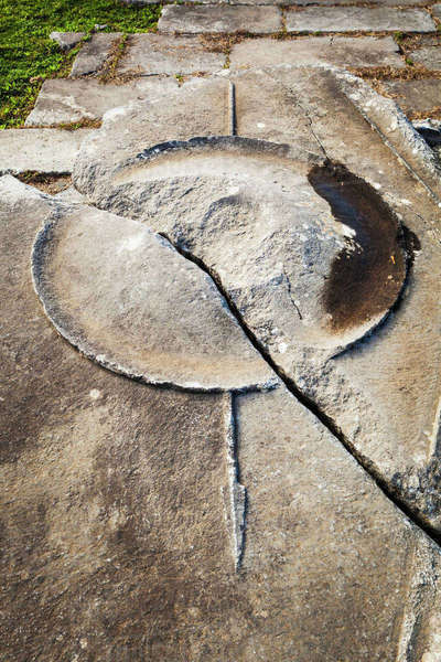 Carved Shield And Spear In Rock With A Crack; Philippi, Greece ...