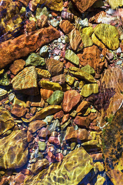 Close Up Of Colourful Creek Stones Underwater With Ripples In Water ...