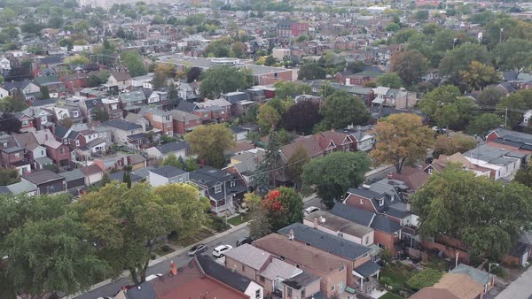 Aerial establishing shot of a generic residential area in a large city ...