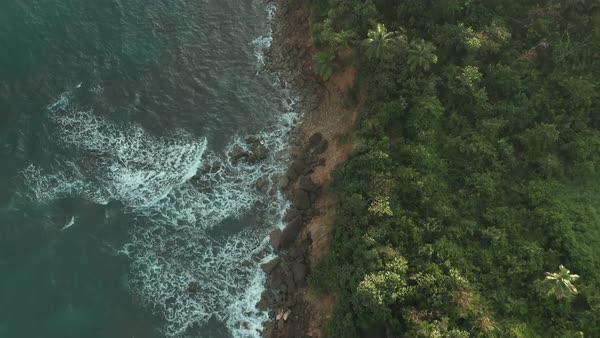 Aerial establishing shot of a beautiful beach. Cinematic 4K footage ...