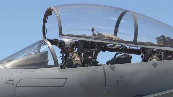 The canopy closes on an F-15E Strike Eagle during Red Flag 14-3 Jul. 23 ...