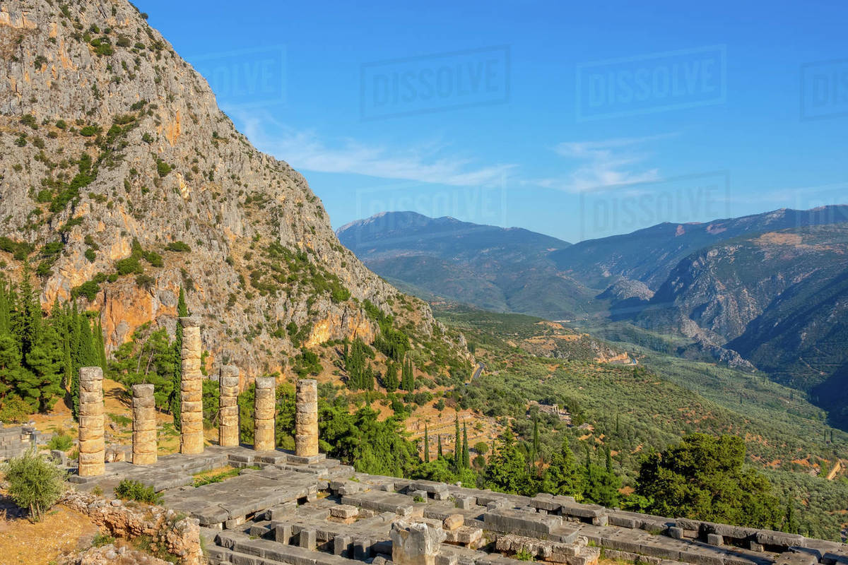 Greece. Delphi. Ancient ruins in the mountains. Sunny weather and blue ...