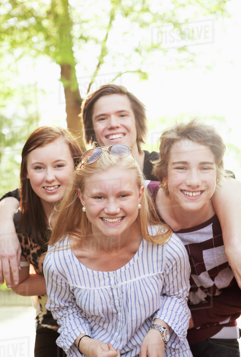 Portrait of cheerful friends together - Royalty-free Stock Photo | Dissolve