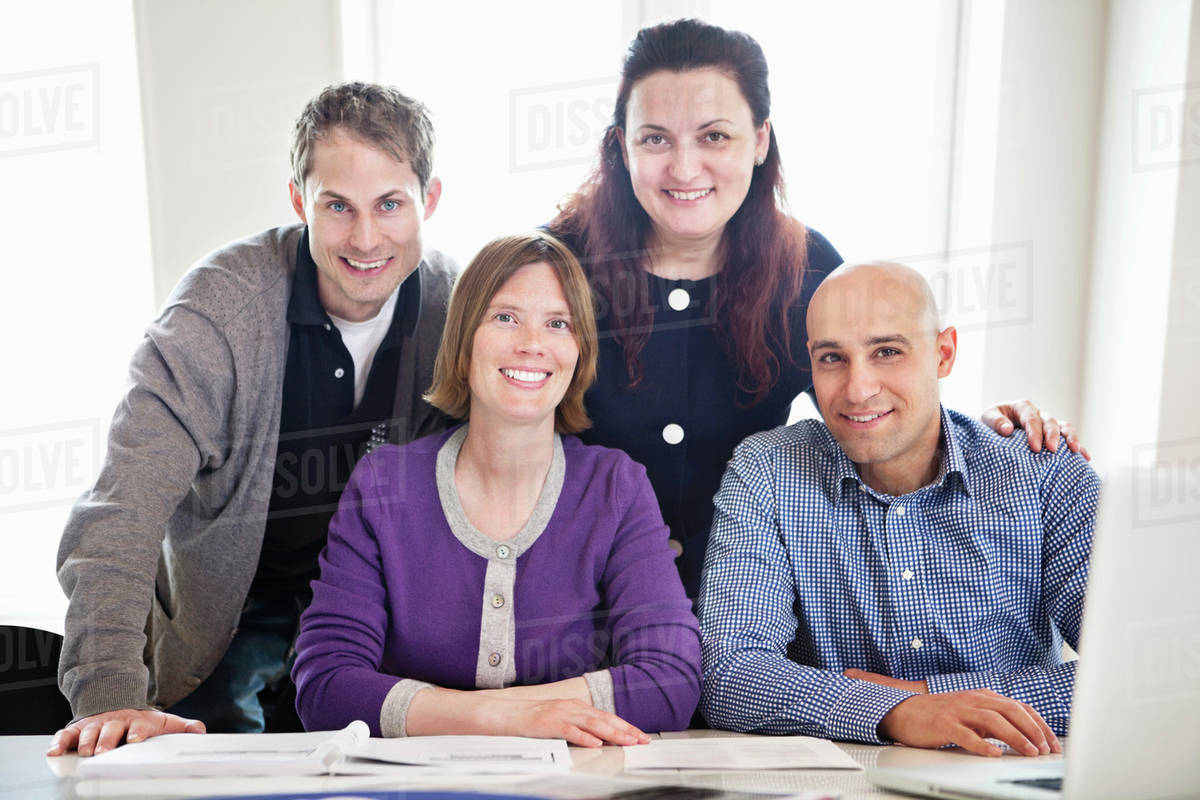 Portrait of happy business group in a meeting - Royalty-free Stock ...