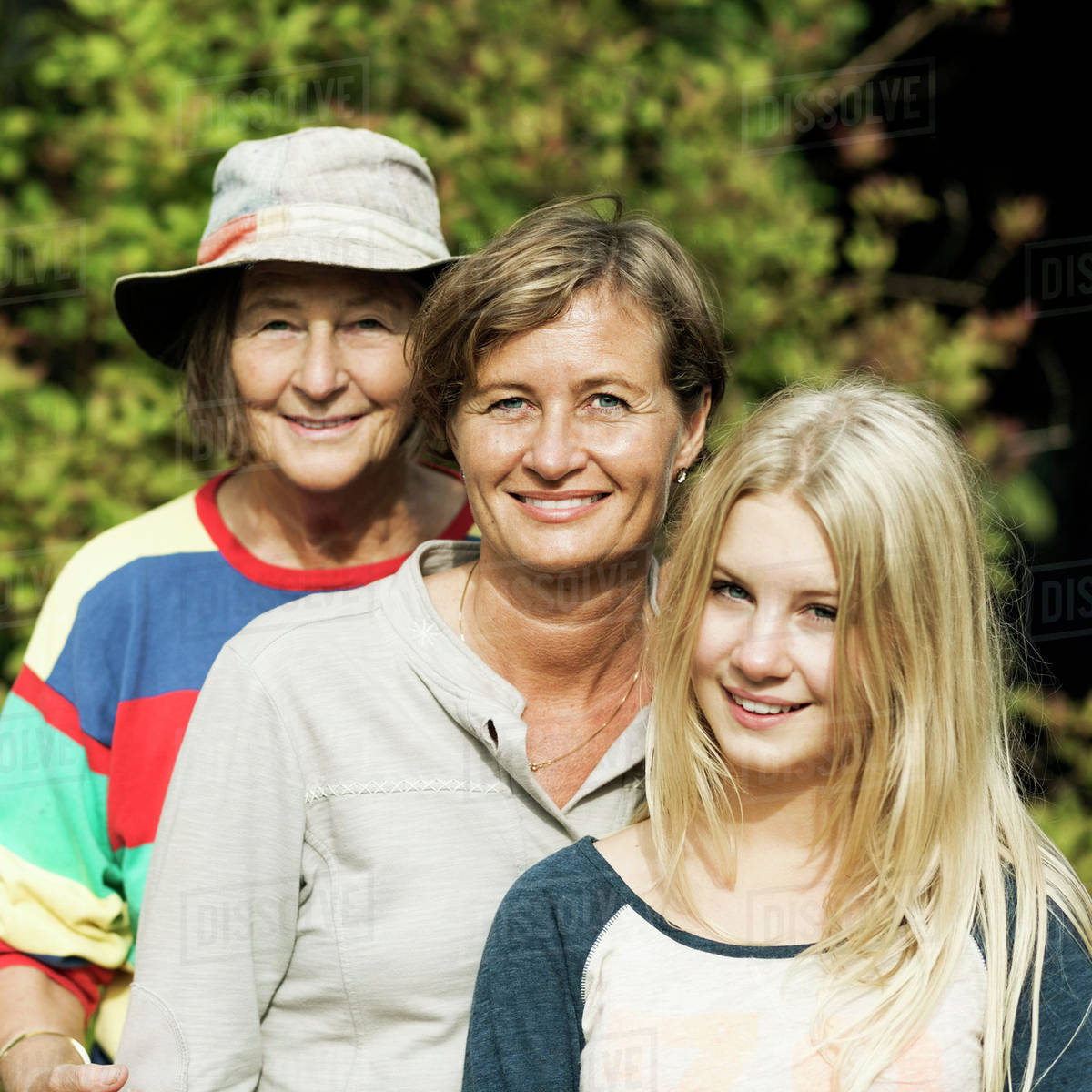 Portrait of happy three generation females at yard - Royalty-free Stock ...