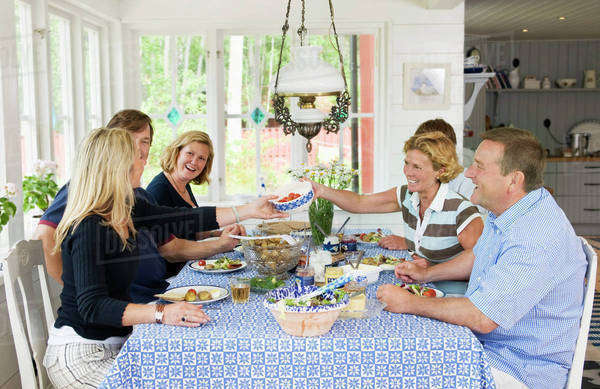 Dinner party with six people - Royalty-free Stock Photo | Dissolve