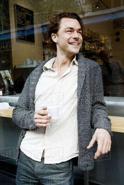 Man with cup - Royalty-free Stock Photo | Dissolve