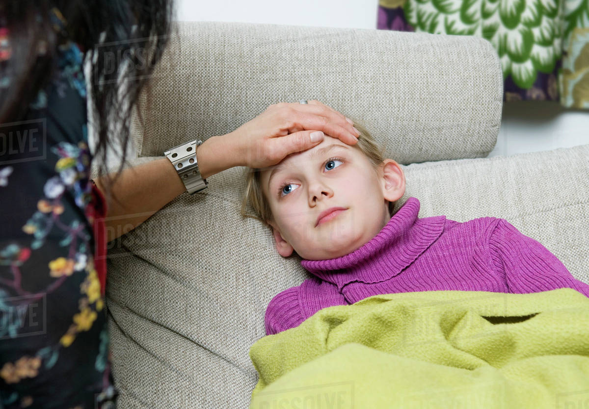 Taking care of sick child - Royalty-free Stock Photo | Dissolve