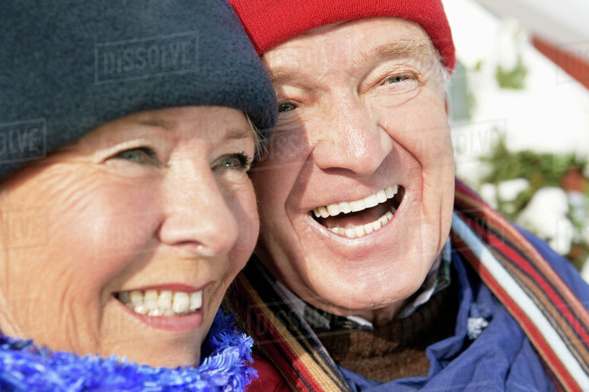 Two happy people outdoors - Stock Photo - Dissolve