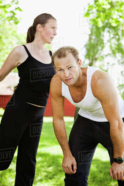 Two tired runners - Stock Photo - Dissolve