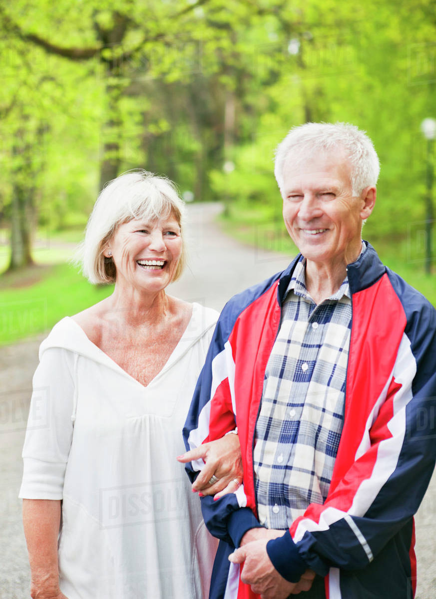 Happy senior citizens on a stroll - Royalty-free Stock Photo | Dissolve
