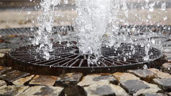 Water Gushing From Manhole - Stock Video Footage - Dissolve