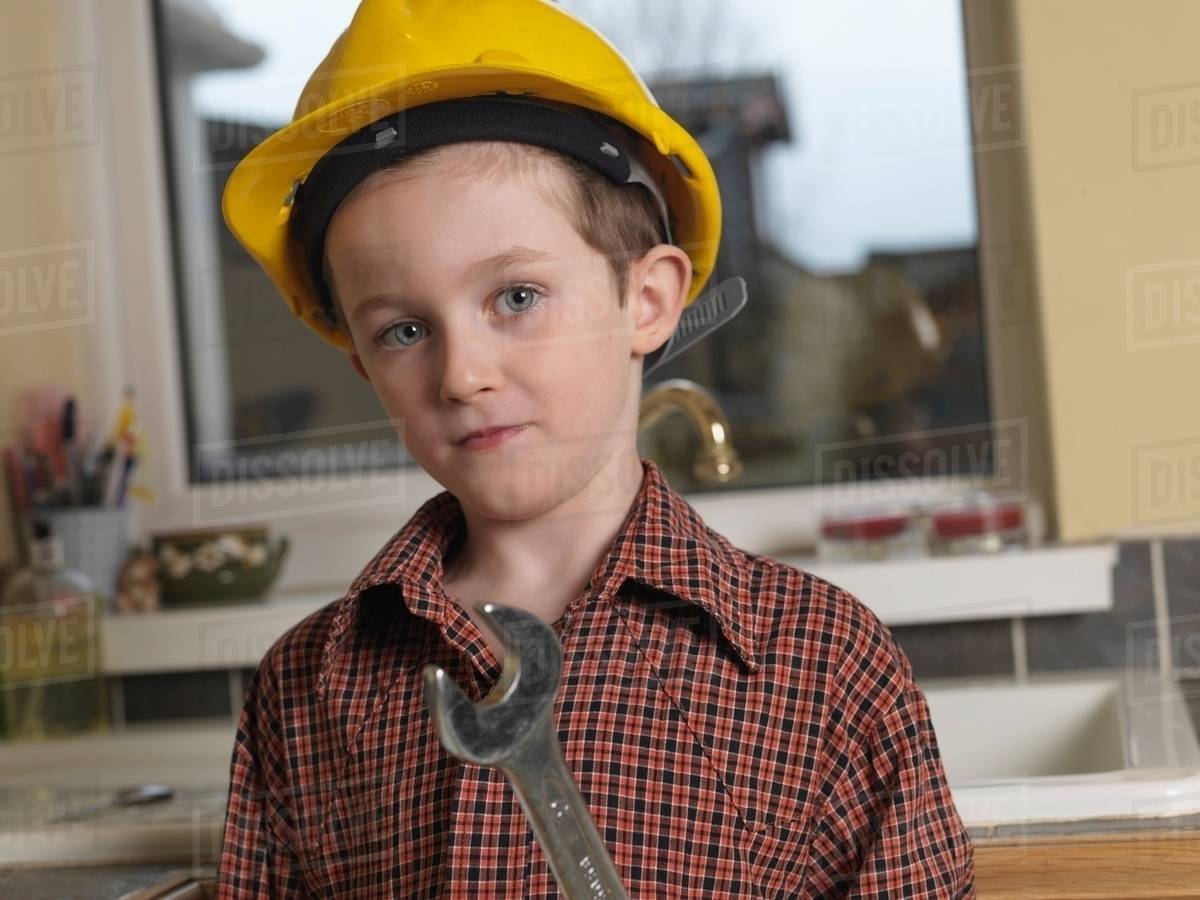 Boy dressed as builder - Royalty-free Stock Photo | Dissolve