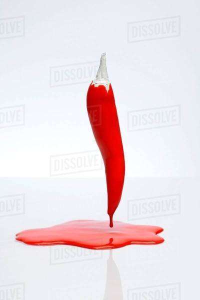 Red chili dripping - Stock Photo - Dissolve
