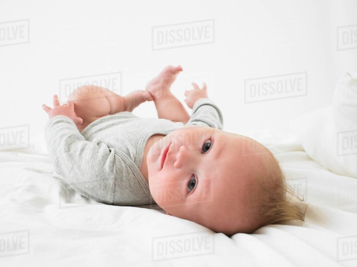 Baby on back - Royalty-free Stock Photo | Dissolve