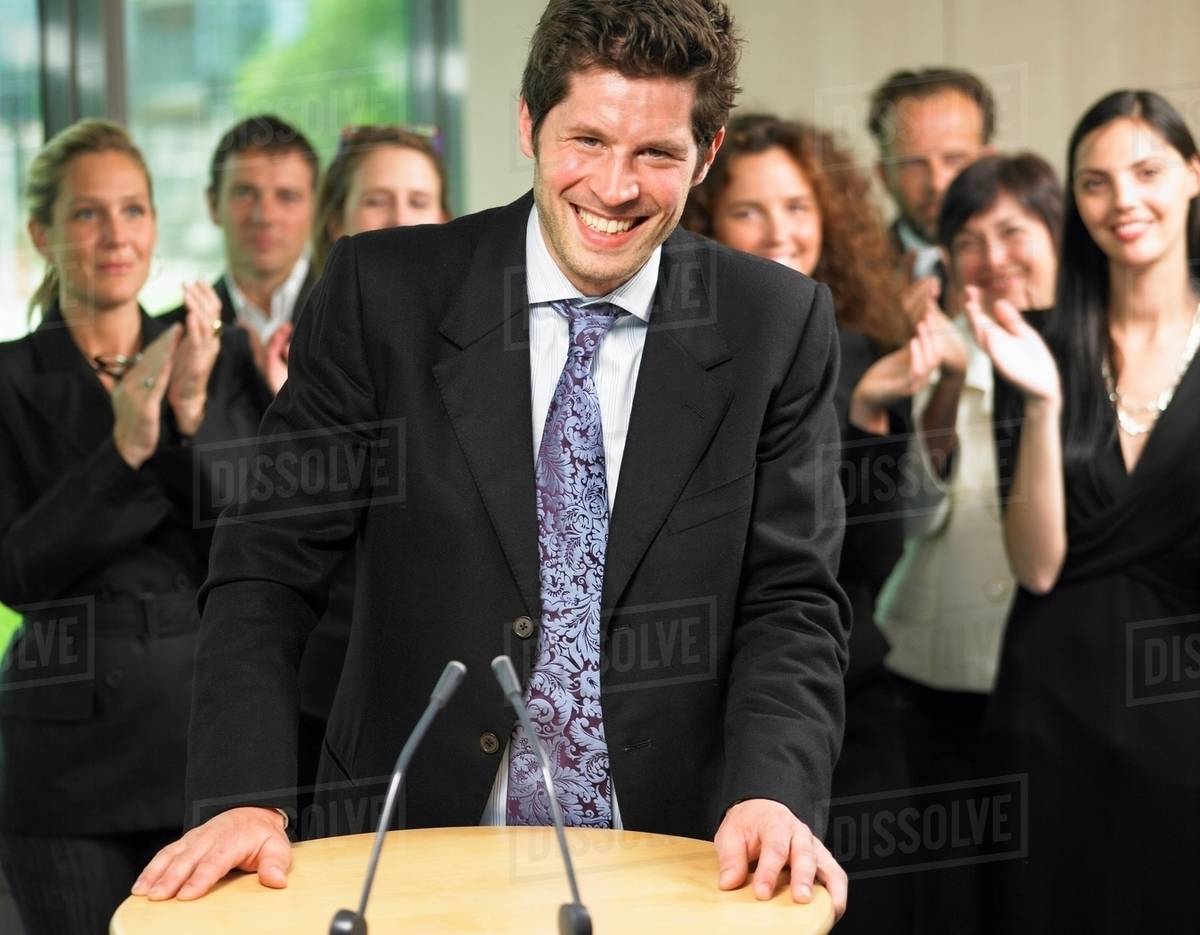Business man giving a conference - Stock Photo - Dissolve