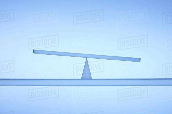 Balance leaning slightly to one side - Royalty-free Stock Photo | Dissolve