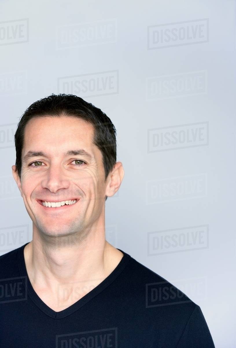 Portrait of a smiling man - Royalty-free Stock Photo | Dissolve