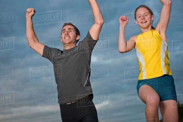2 athletes celebrating - Royalty-free Stock Photo | Dissolve