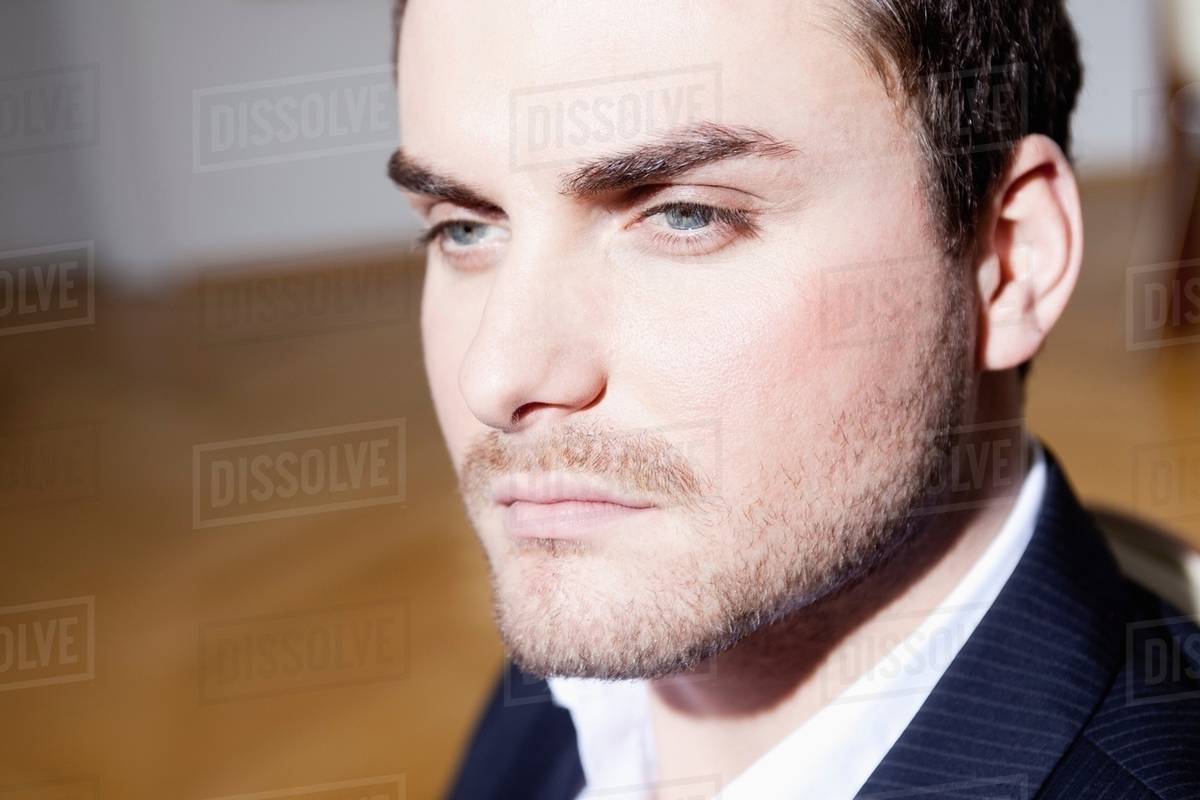 Man looking serious - Royalty-free Stock Photo | Dissolve